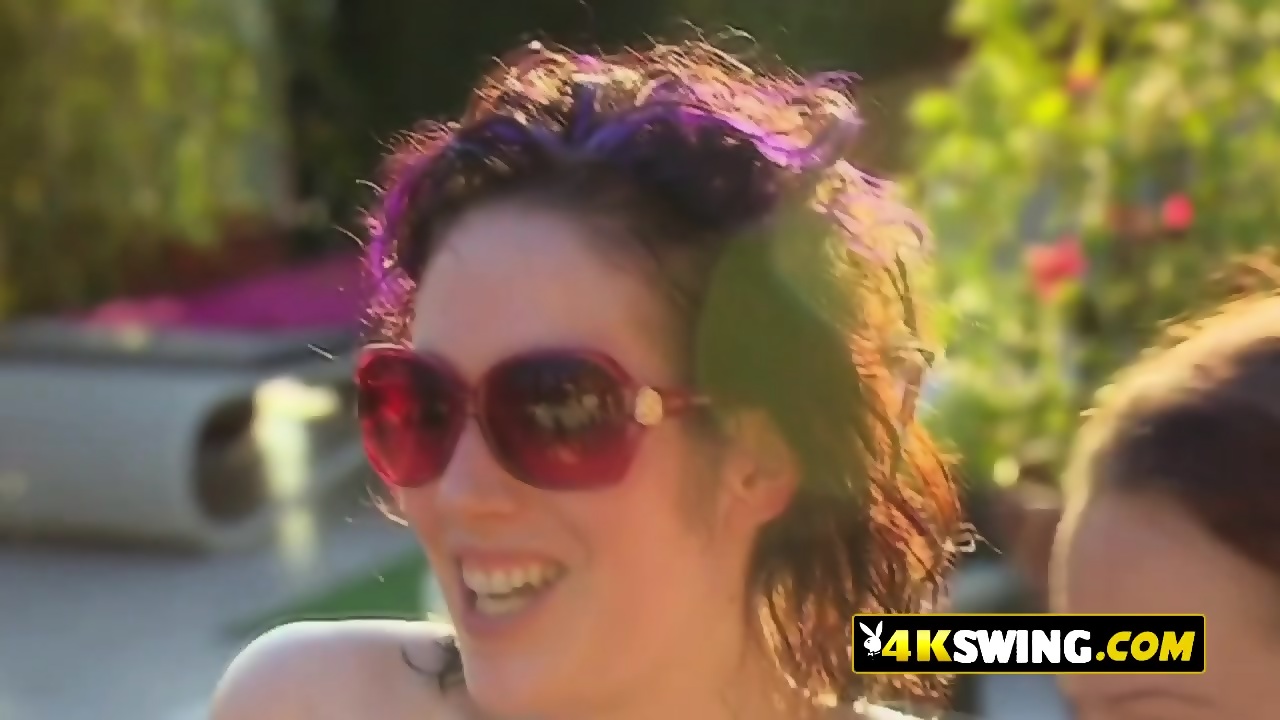 A Hot Brunette Is Sunbathing While Receiving Oral Sex Next To The Pool
